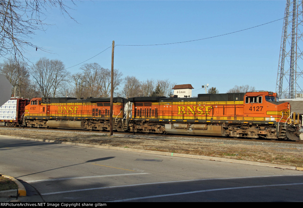 BNSF 4127 leads a Eb freight into town.